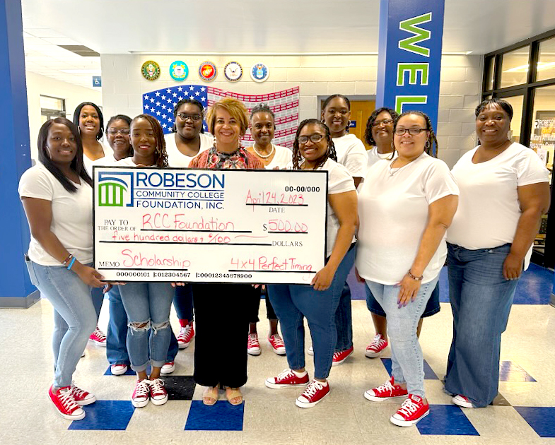 Women’s group gives back, paying it forward for students | Robeson ...